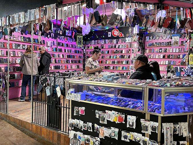 Pink walls create the perfect backdrop for phone case hunting. In this tech bazaar, your smartphone can get dressed up fancier than you on a Friday night.