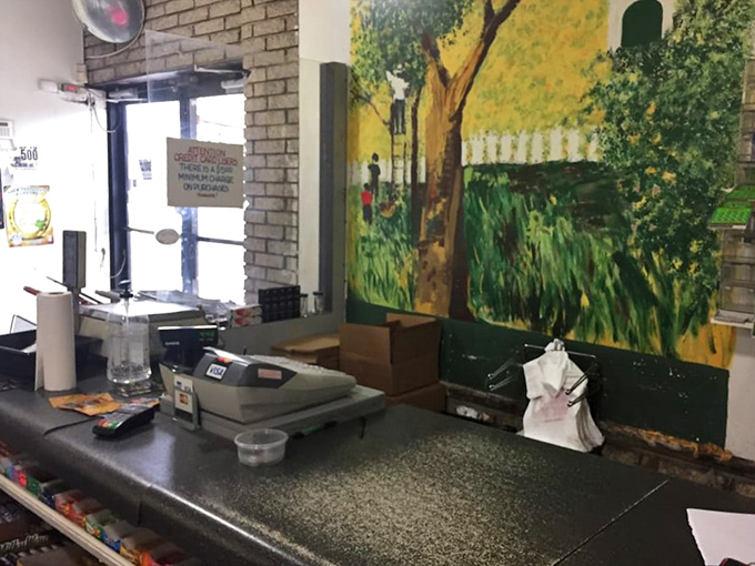 Behind this counter, sandwich artists perform their daily magic. The ornate tin ceiling above has witnessed countless "I'll take a 3-layer" declarations.