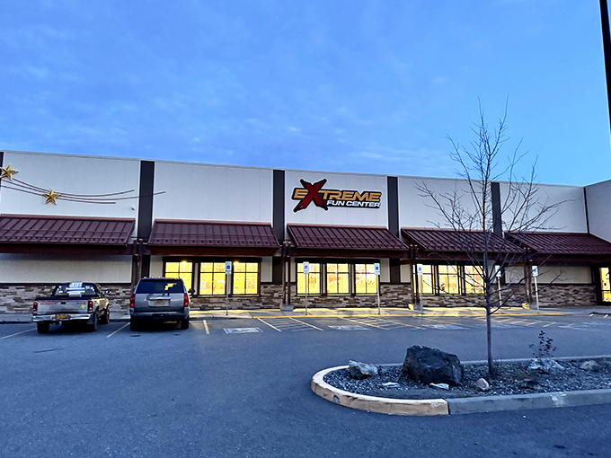 Twilight transforms this entertainment fortress into a beacon of fun, glowing with promise as the Alaskan evening settles in.