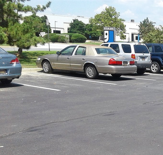 The parking lot of possibility. Each vehicle represents someone who knows that Delaware's best-kept shopping secret isn't at the mall.