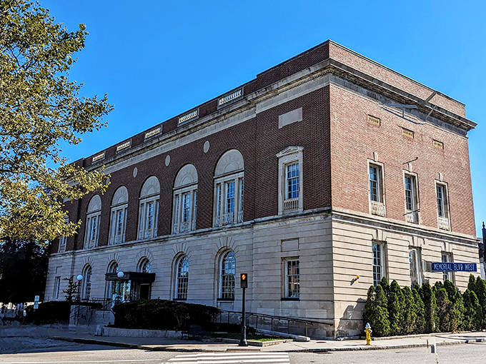 This stately brick building has witnessed centuries of Newport history. Its classical columns stand like sentinels guarding stories of the city's storied past.