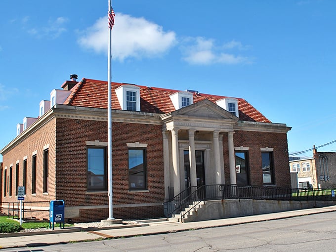 The stately Post Office stands proud, its columns and red roof a reminder of when public buildings inspired awe.