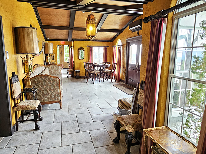 Sunshine streams through windows in this golden-hued sitting room where you half expect to find a duchess penning letters or plotting a royal intrigue.