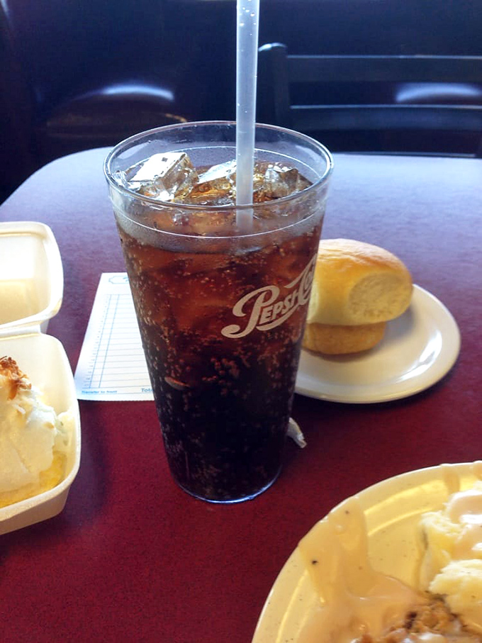 That classic glass of cola with ice &ndash; the perfect companion to cut through the richness of comfort food and keep the conversation flowing.