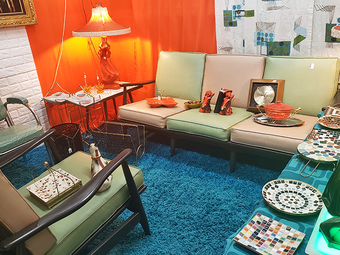 The living room that time forgot, where avocado green and turquoise blue create a retro oasis that would make Don Draper feel right at home.