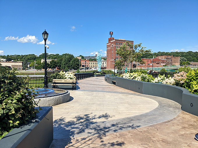 Amsterdam's downtown promenade offers benches with million-dollar views at zero-dollar admission. The flowers are complimentary; the serenity is priceless.