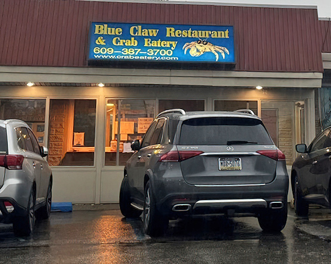Blue Claw's straightforward sign tells you exactly what you're getting&mdash;no pretense, just crab-cracking, finger-licking seafood satisfaction.