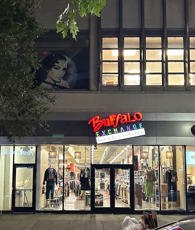 Buffalo Exchange's nighttime glow beckons fashion-forward shoppers looking for unique style after dark.