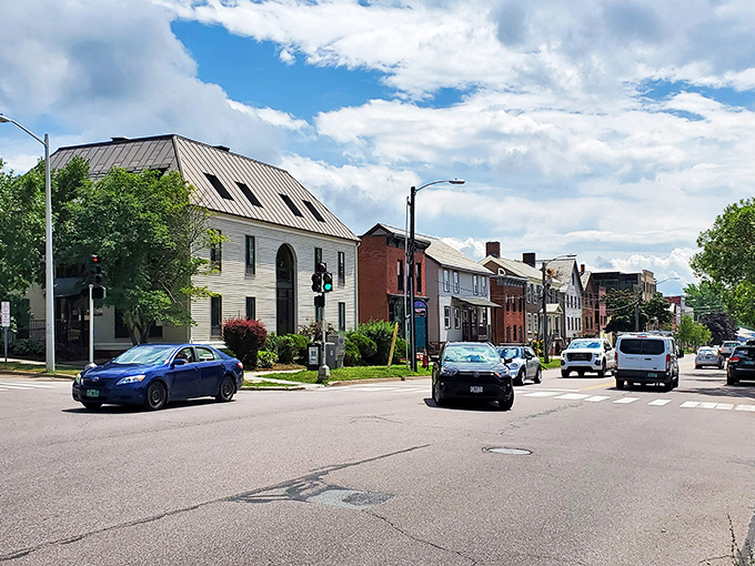Burlington's streets invite exploration, with mountains peeking between buildings like nature checking in on city life.