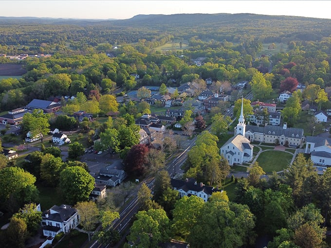 Farmington's aerial view reveals a patchwork of modern convenience and historic charm, where past and present shake hands daily.