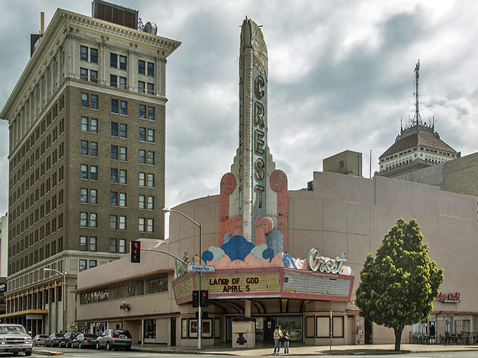 Fresno's historic Crest Theatre marquee lights up downtown, offering cultural experiences that won't drain your retirement savings.