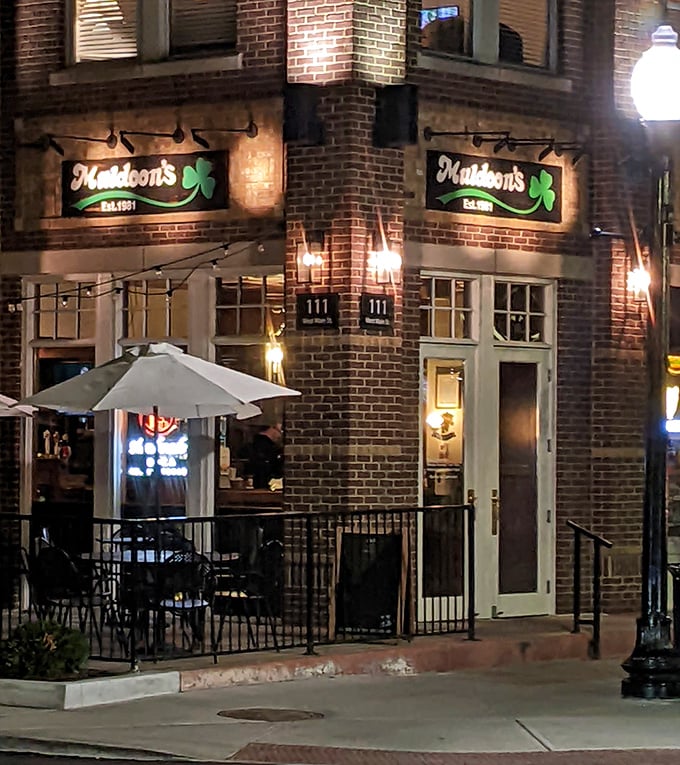 Muldoon's brick facade glows with Irish charm at night, promising tenderloin treasures within those welcoming doors.