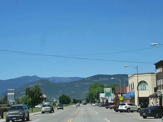 Plains welcomes visitors with its classic small-town main street, framed by mountains that seem to whisper, "Slow down, you're home now."