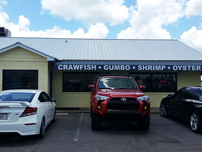 The Shrimp Basket's cheerful yellow exterior promises sunshine on a plate, even on cloudy Mississippi days.