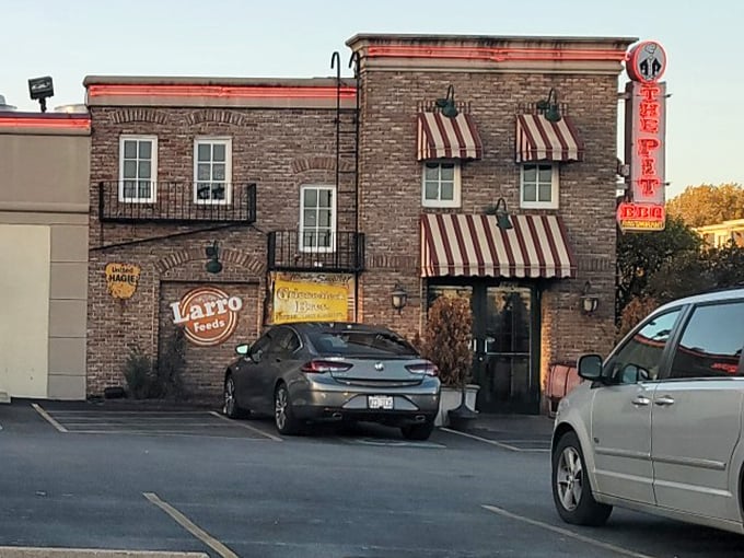 The Pit Rib House (Hickory Hills): Brick facade with striped awnings&mdash;The Pit dresses like it's going to Sunday dinner, then serves BBQ that makes you forget your manners.