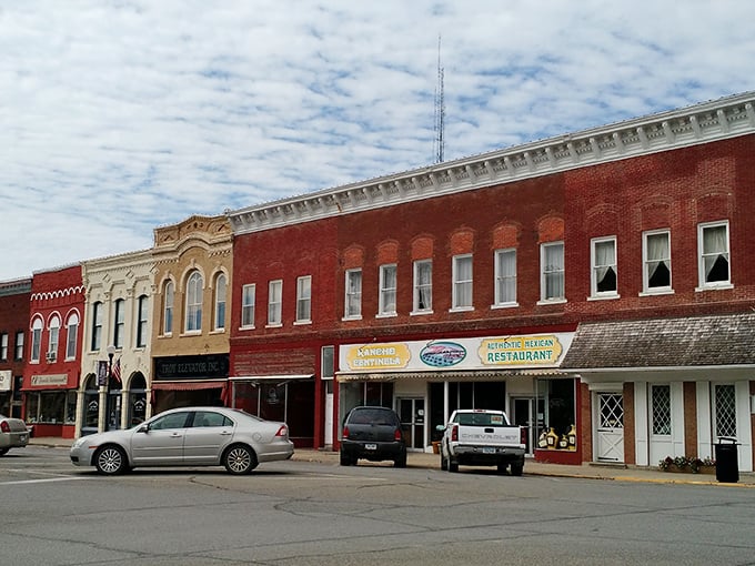 Bloomfield's historic architecture stands proudly against an autumn sky. The kind of town square that makes you want to grab a coffee and watch the world go by.