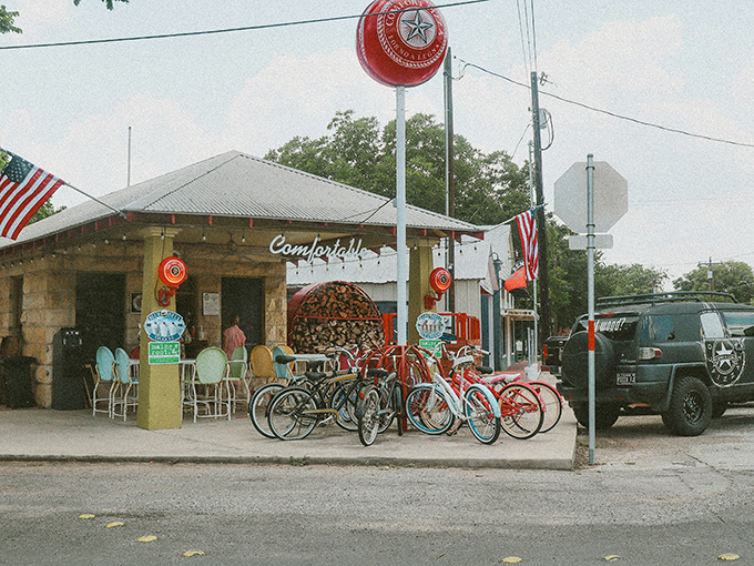 Colorful rental bikes stand ready outside Comfort's shops&mdash;the perfect way to explore at the right speed.
