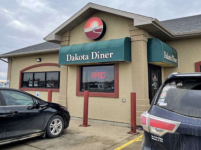 The green awning of Dakota Diner stands ready to shelter you from both prairie storms and disappointing chain restaurant experiences.