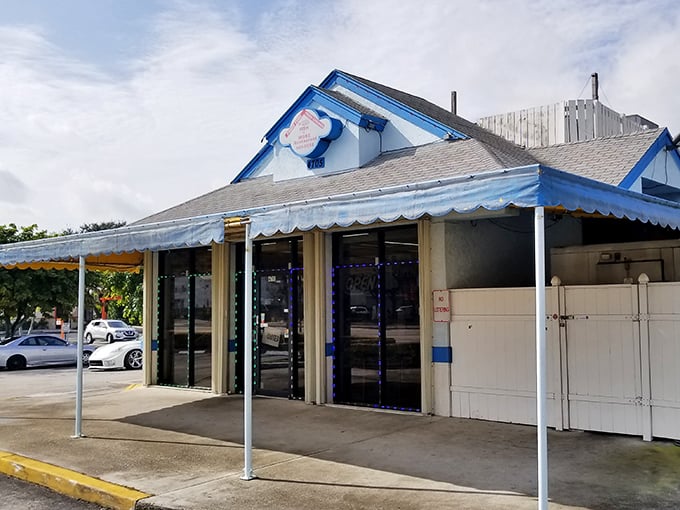 The simple blue awning and white walls might not scream "food paradise," but your taste buds will get the message loud and clear.