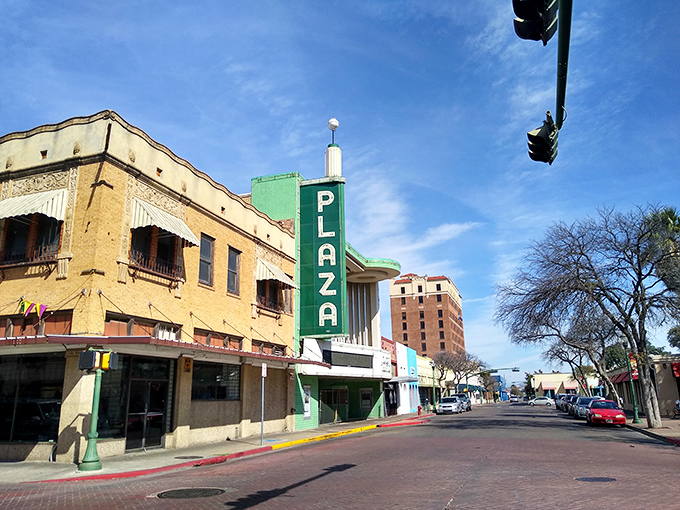 The iconic Plaza Theatre sign in Laredo stands as a colorful beacon of affordable living. Where retirement dreams get the VIP treatment!