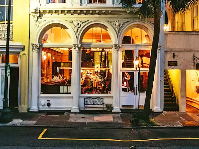 Evening at Oak Steakhouse transforms this historic building into a glowing temple of beef. Those windows have witnessed countless "mmm" moments.