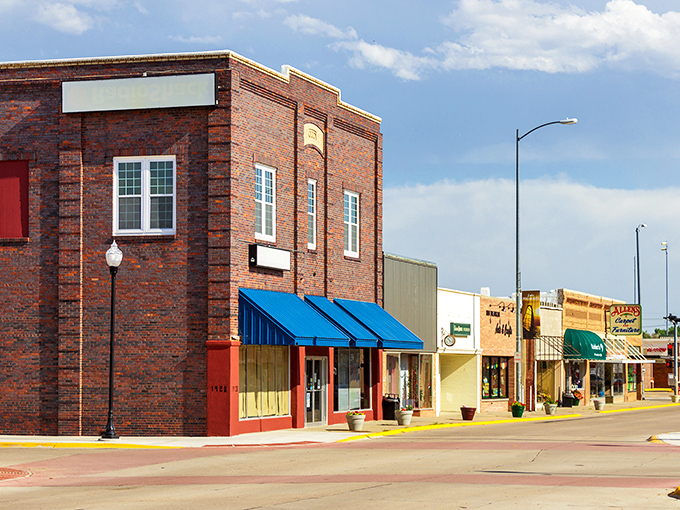 Blue awnings pop against red brick in Ogallala, where Arbor Day was born and charm never left.