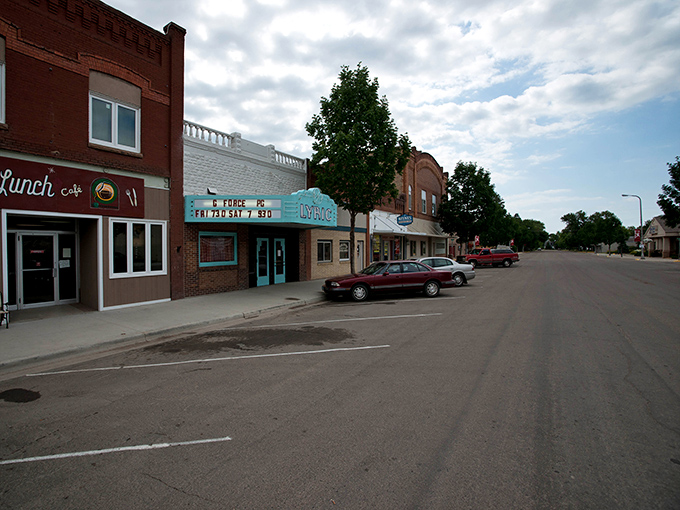 Historic buildings line Park River's main street, where modern life and small-town values blend perfectly.