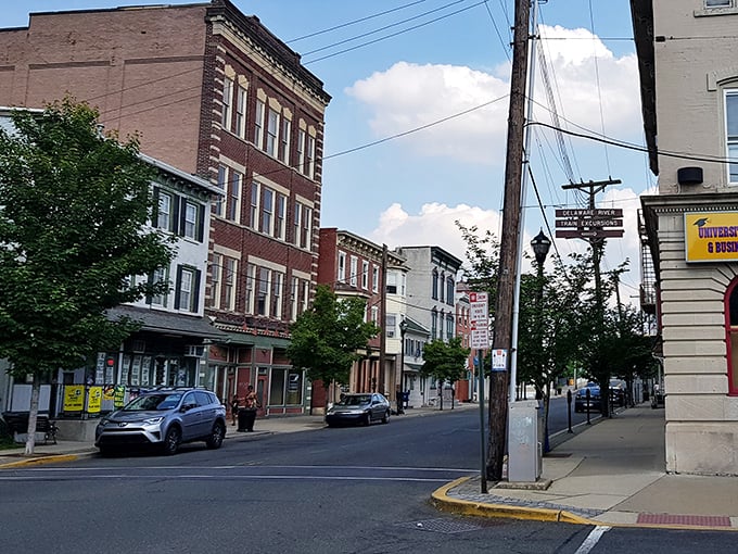 Tree-lined residential streets in Phillipsburg offer affordable housing options with classic architectural details intact.