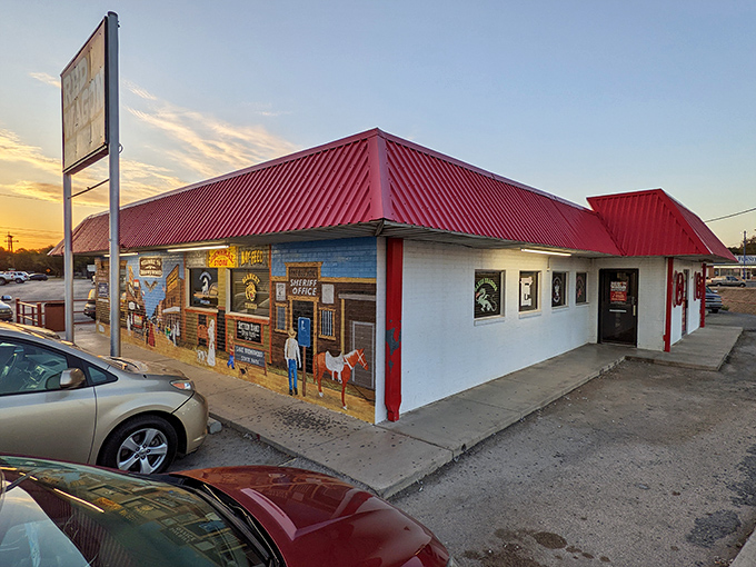 That western-themed mural isn't just decoration&mdash;it's a preview of the authentic Texas experience waiting inside those doors.