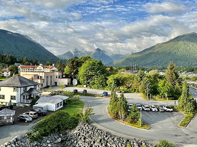 Sitka unfolds among towering mountains, with the town nestled comfortably at their base.