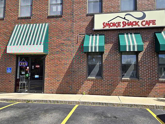 Green awnings and red brick give Smoke Shack Cafe that neighborhood joint feel. Where regulars become family and sauce stains are inevitable.
