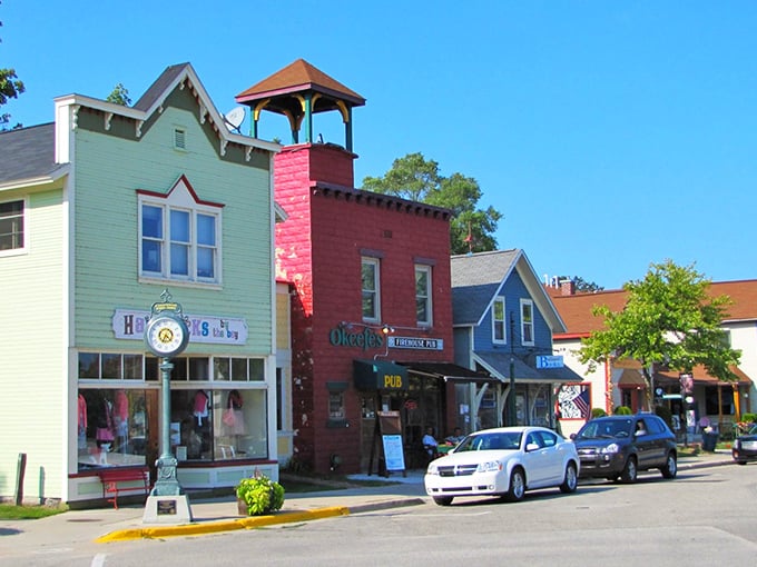 Suttons Bay's vibrant downtown invites exploration, with colorful awnings providing shade for window-shoppers on sunny Michigan afternoons.