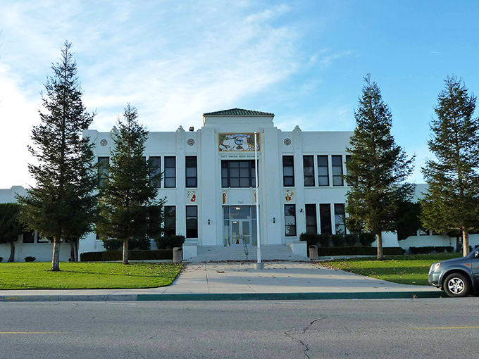 Taft's classic civic building stands proudly under blue skies, representing the town's stable community and affordable amenities.