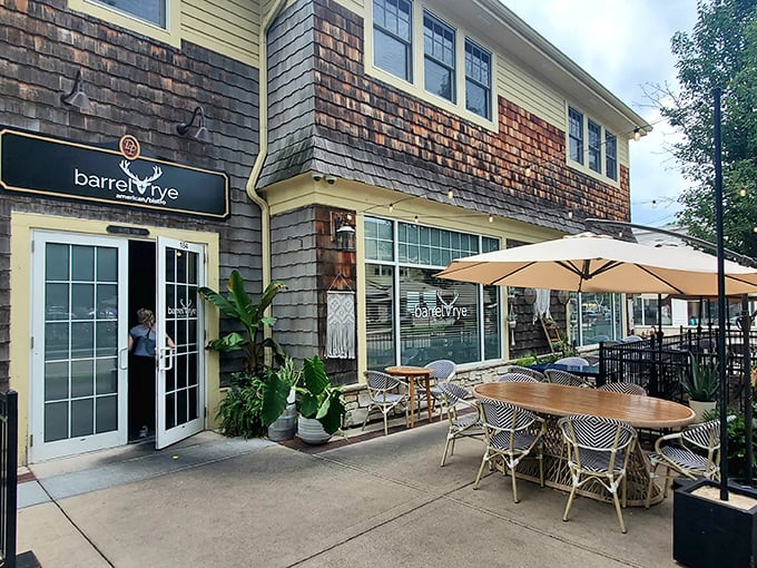Barrel + Rye's patio isn't just outdoor seating&mdash;it's an urban oasis. Those striped chairs practically whisper "order another round and watch the world go by."
