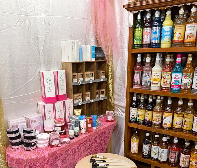 A pink-draped beauty section neighboring shelves of flavored syrups &ndash; because self-care comes in many delicious forms.