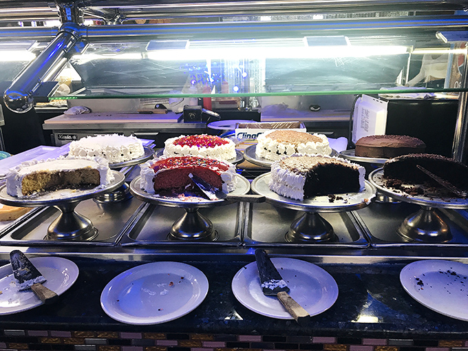 Cake paradise: where diet plans go to die happy. That chocolate one is giving me "just one bite" vibes.