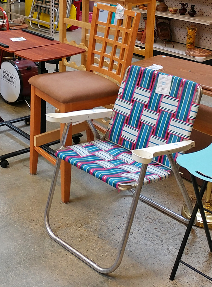 The lawn chair your childhood memories ordered. That woven pattern screams "1970s cookout" in the best possible way.