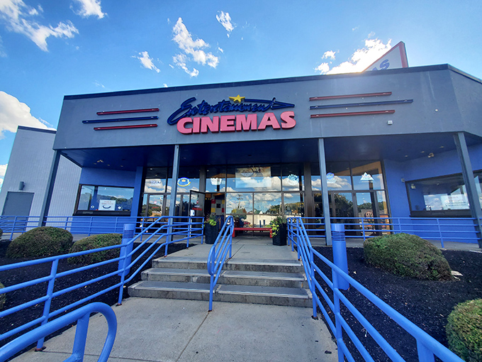 Entertainment Central Cinema's bright blue railings and retro signage offer a nostalgic escape—where the biggest decision is butter or no butter.