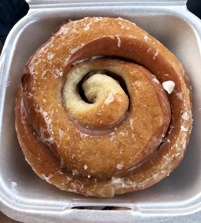 This cinnamon roll donut is what happens when two breakfast favorites decide to elope. The spiral pattern hypnotizes you into taking another bite.