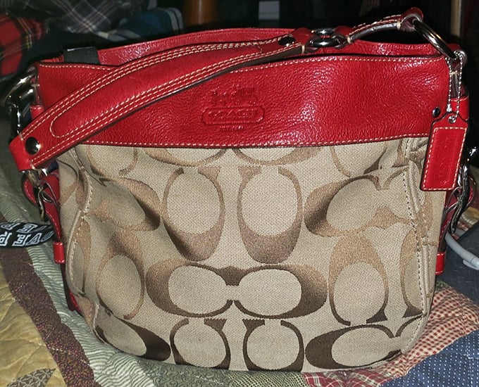 Designer finds hiding in plain sight! This Coach bag waits patiently for someone who understands the thrill of the thrift hunt.