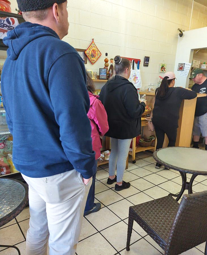 The line forms early for a reason. These customers know that waiting for The Burrito Lady's creations is like standing in line for front-row concert tickets—worth every minute.