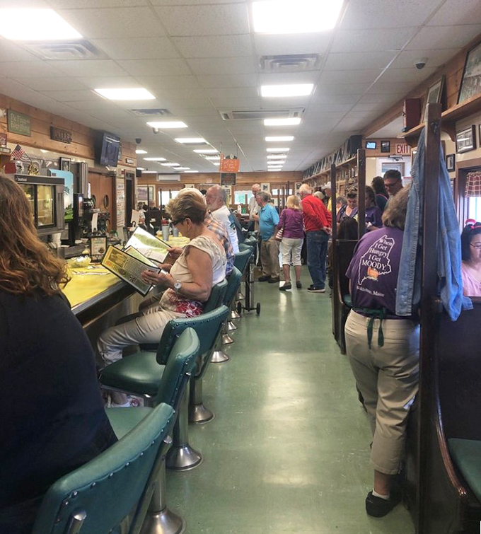 The counter where strangers become friends over pie. Moody's bustling interior proves good food brings people together.