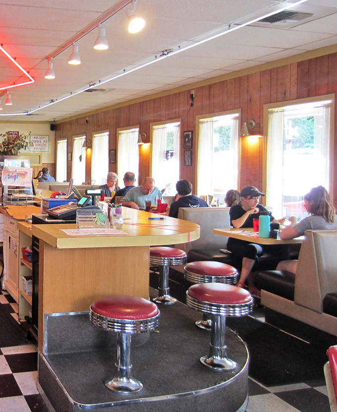Where strangers become neighbors over coffee, these booths have heard more local stories than the town newspaper.