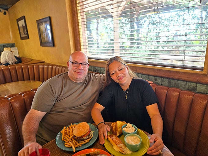 Happy diners with that unmistakable "we've discovered something special" glow. Their plates tell the delicious story.