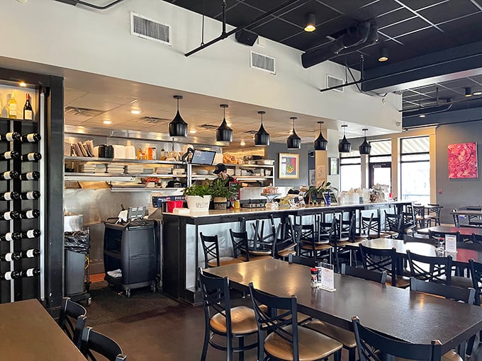 The open kitchen concept lets you witness culinary magic in action. Clean lines, modern fixtures, and an atmosphere that balances sophistication with approachability.