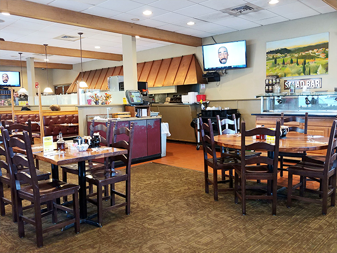 The dining area balances "family restaurant" with "place you'd actually want to eat." Note the salad bar in the background—for those who took a wrong turn at breakfast.