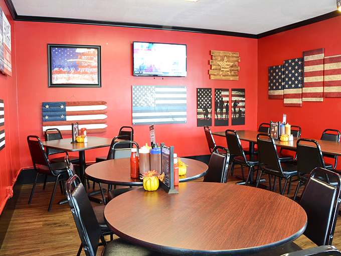 The dining area's patriotic decor and round tables create that perfect "everybody knows your name" vibe that makes regulars out of first-timers.