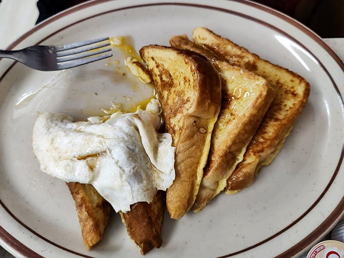 French toast that's had a proper soak in the egg mixture &ndash; none of that rushed dipping nonsense. The result? Custardy perfection worth waking up for.