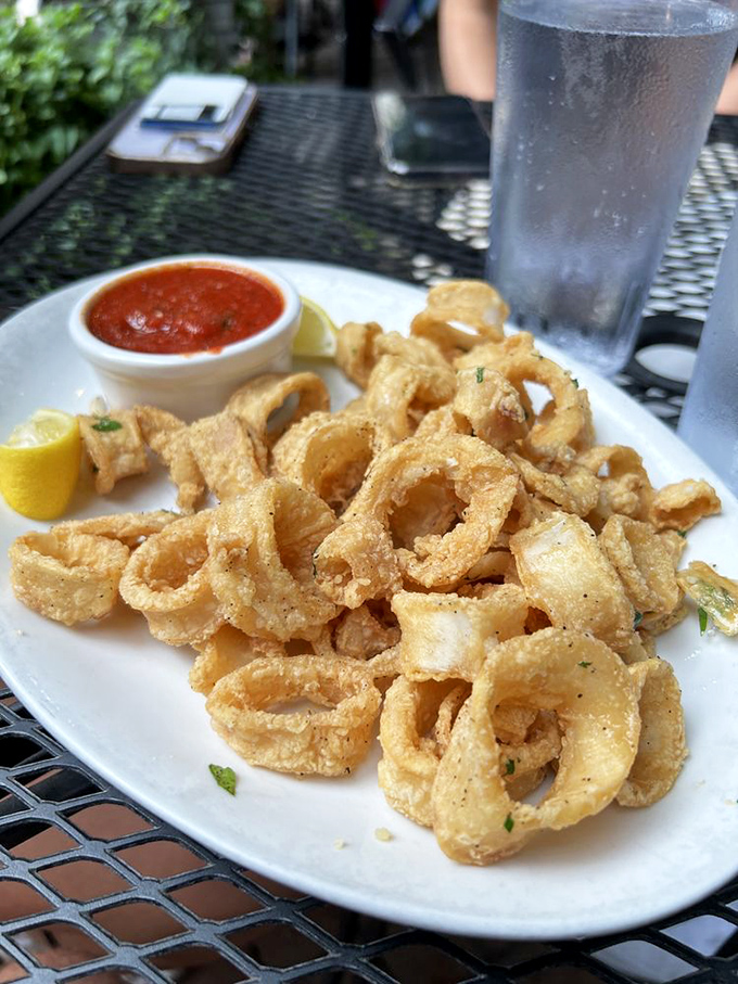 Calamari so perfectly crisp it makes you wonder if the chef has some kind of secret pact with the fryer gods.