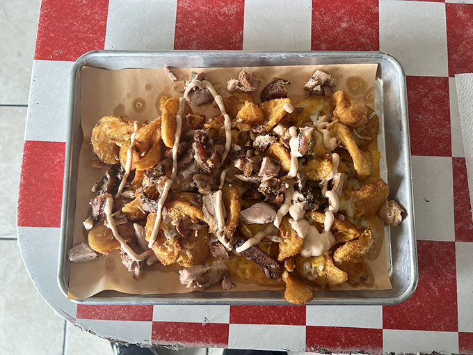 When funeral potatoes meet pulled pork on crispy fries, Utah comfort food reaches its absolute peak potential.